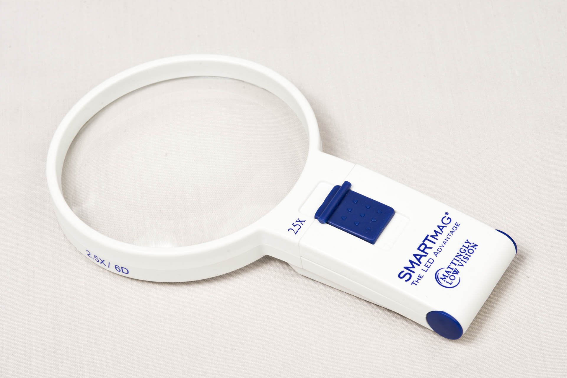 SmartMag® 2.5X Teal LED Hand-Held Magnifier | Mattingly Low Vision, Inc.